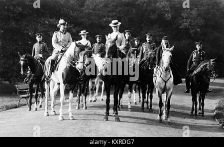 A historical photograph showing the German Imperial flag being hoisted ...