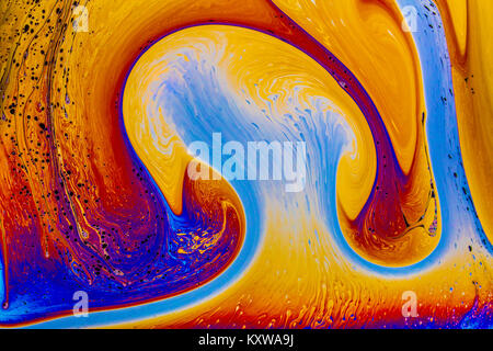 Optical thin film interference patterns in a stretched soap solution ...