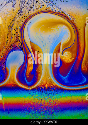 Optical thin film interference patterns in a stretched soap solution ...