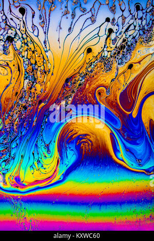 Optical thin film interference patterns in a stretched soap solution ...