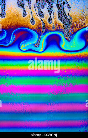 Optical thin film interference patterns in a stretched soap solution ...