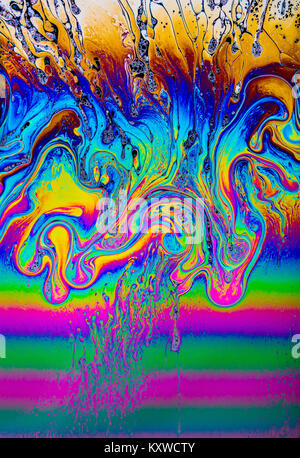 Optical thin film interference patterns in a stretched soap solution ...