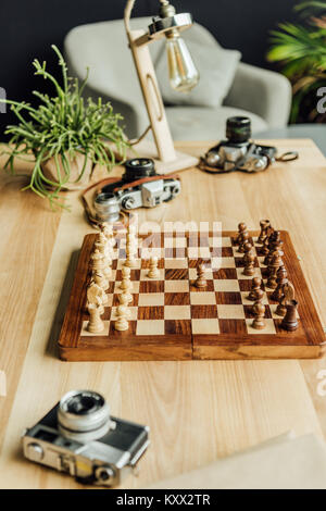 High angle view of chess board with chees pieces set for new game ...