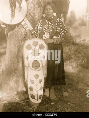 Cradle and mother Stock Photo - Alamy