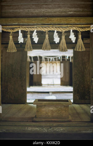Japan, Kyushu. Shinto Altar with Shimenawa Rope and Shide White Paper ...