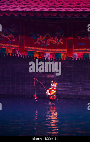 Water puppet fishing, Thang Long Water Puppet Theatre, Hanoi, Vietnam ...