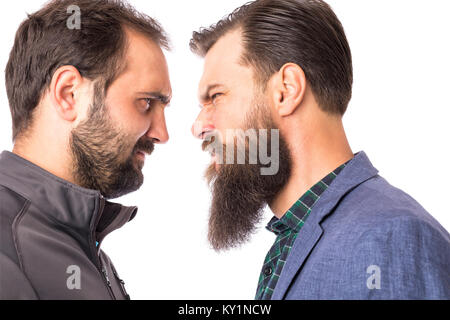 Two bearded angry men standing face to face isolated on white ...