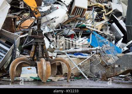 Powerful mechanical grabbing arm is the force that moves old scrap ...