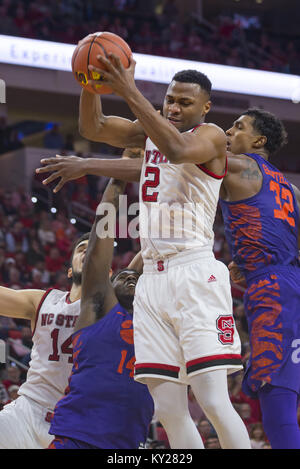 North Carolina State's Torin Dorn (2) and North Carolina's Cameron ...