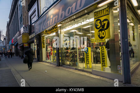 A women's clothing store announces its new year clearance sales Stock ...