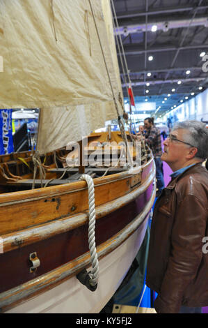 A man taking photo with the exhibits at the exhibition of Zao Wou-Ki ...