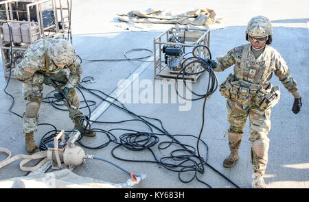 The choreography of the Water Purification Platoon as they rig the ...