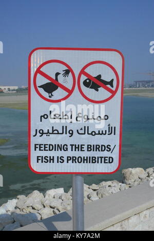 Do not feed fish sign Stock Photo - Alamy