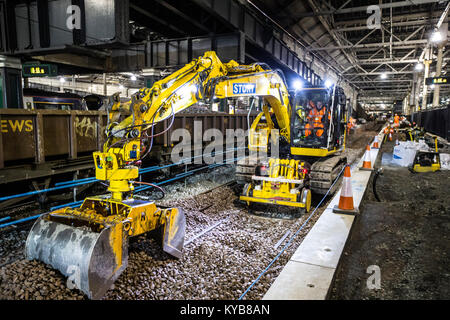 Rail Construction workers working night shift Stock Photo - Alamy