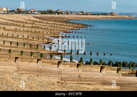wooden beach groynes, coastal sea defences at overstrand on the norfolk ...
