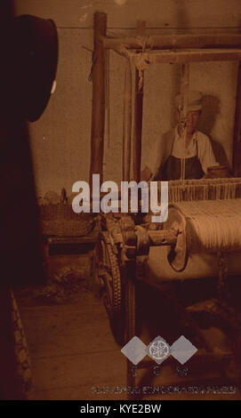 A 1963 photograph depicting the traditional Slovenian craft of basket ...