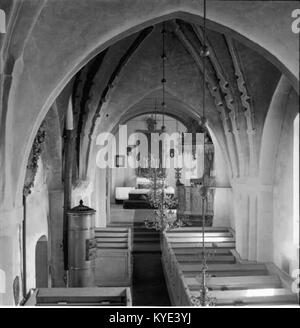 Torsåkers Church, a medieval stone church in Sweden, represents a ...