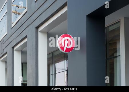 Sign on facade at headquarters of social network Nextdoor in San ...