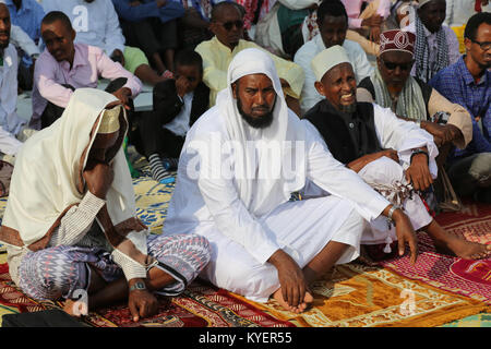 Residents of Kismaayo, Somalia, gather at the Mahfalka camp, preparing ...