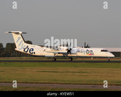 A photograph of the Flybe De Havilland Canada DHC-8-402Q Dash 8 (registration G-ECOM) landing at ...