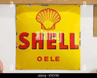 This SHELL enamel advertisement sign, displayed at the Den Hartog Ford ...