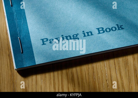 Close up detail of a bank paying in book Stock Photo - Alamy