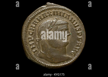Ancient Roman coin of Emperor Maximian, top view of old metal money ...