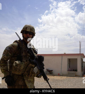 Staff Sgt. Robert Foushee of Lexington, Ky. conducts security checks ...
