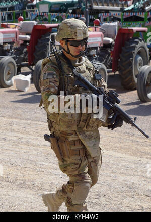 Staff Sgt. Robert Foushee of Lexington, Ky. conducts security checks ...