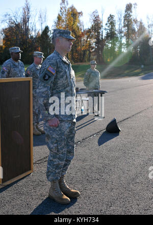 Kentucky Army National Guard Lt. Col. Scott C. Thomas receives the ...