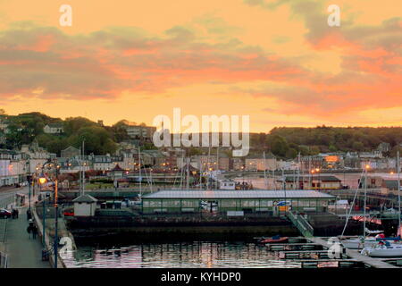 sunset night shot of Rothesay harbour with the ferry argyle docking for ...