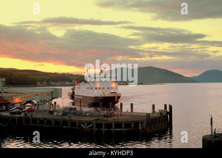 sunset night shot of Rothesay harbour with the ferry argyle docking for ...