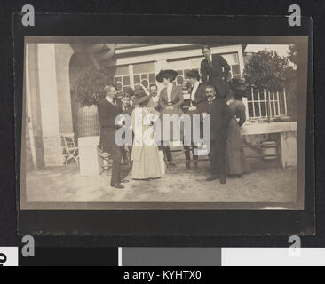 Photograph of Sam Eyde and Ulla Eyde with a group in Lübeck, Germany ...