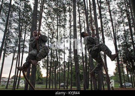 Staff Sgt. Nicholas Anglin (left) and Sgt. Christopher DeLeon begin a ...