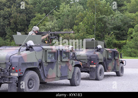 Soldiers of the 149th Military Engagement Team conduct entry control ...