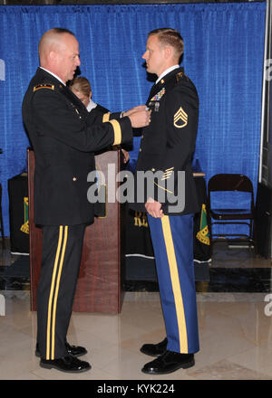 Maj. Gen. Stephen Hogan presents 2nd Lt. Cody Stagner with the Erickson ...