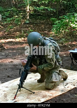 During Expert Infantry Badge (EIB) training, a soldier throws a hand ...