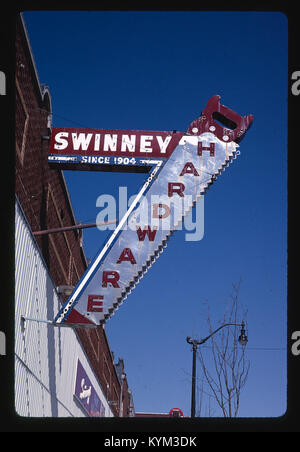 This historic photograph showcases the vintage sign of Hanks Coffee ...
