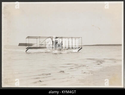 Glenn Curtiss flying his floatplane in 1911. This image captures one of ...