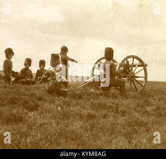 A historical image of artillerymen operating a cannon, captured in a ...