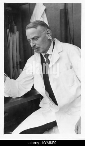 Walter Ray Bloor, a Canadian biochemist, is shown in this image seated ...