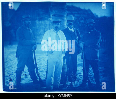 Vintage 19th century photograph: group of people around a cremation ...