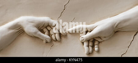Michelangelo God's touch. Close up of human hands touching with fingers ...