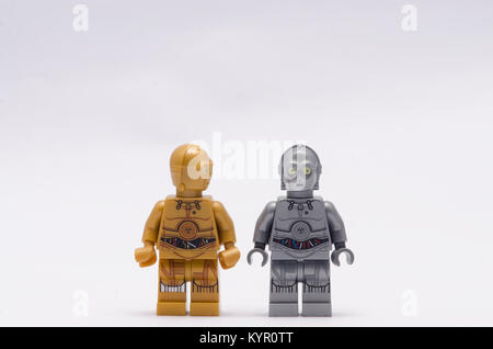 gold and silver c3p0 star wars character robot. Lego minifigures are ...