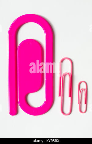 Huge pink paperclip, large big paper clip, isolated on white background ...