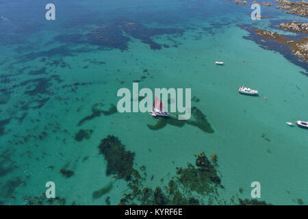 Aerial view over the Minquiers, a group of islands and rocks in the ...
