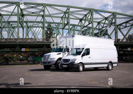 A medium-sized truck while driving. Delivery of goods in the city Stock ...