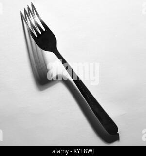 Fork with shadow Stock Photo - Alamy