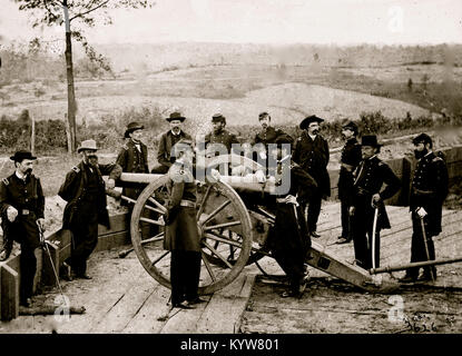 Gen. William T. Sherman, leaning on breach of gun, and staff at Federal ...