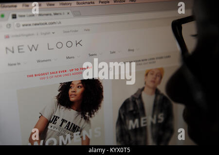 A woman looks at the New Look Stock Photo - Alamy